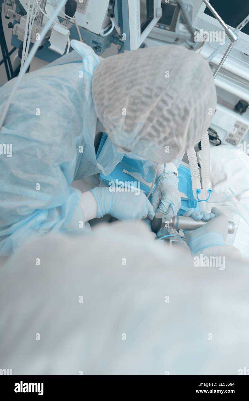 Female doctor during medical procedure Stock Photo - Alamy