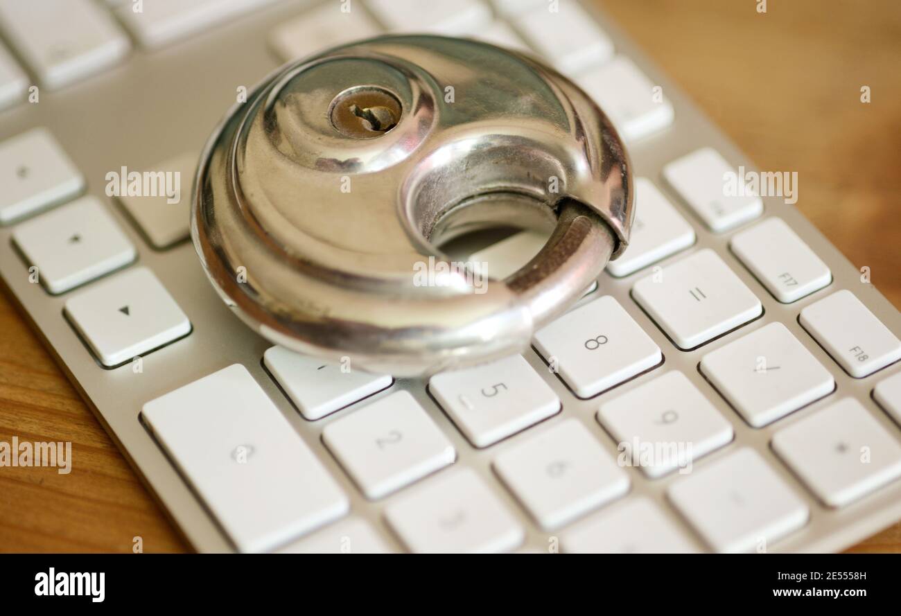 Heavy padlock computer data safety symbol Stock Photo - Alamy