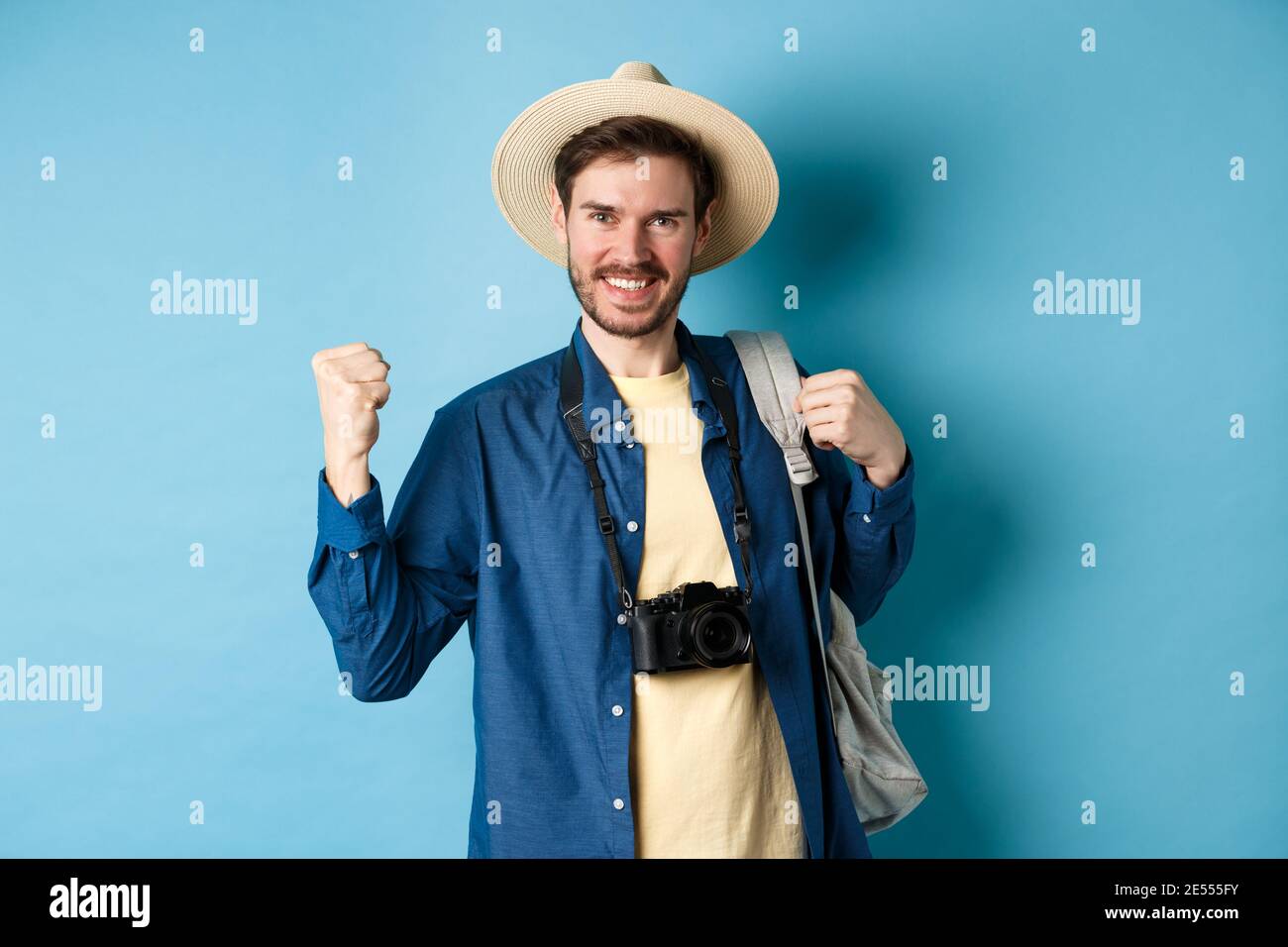 Happy tourist enjoying summer vacation, smiling and saying yes with ...
