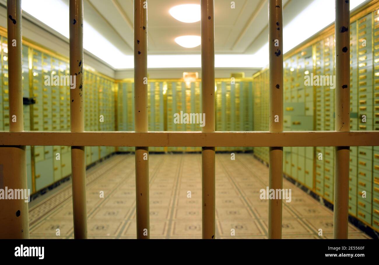 Bank tresor storage room behind bars Stock Photo - Alamy