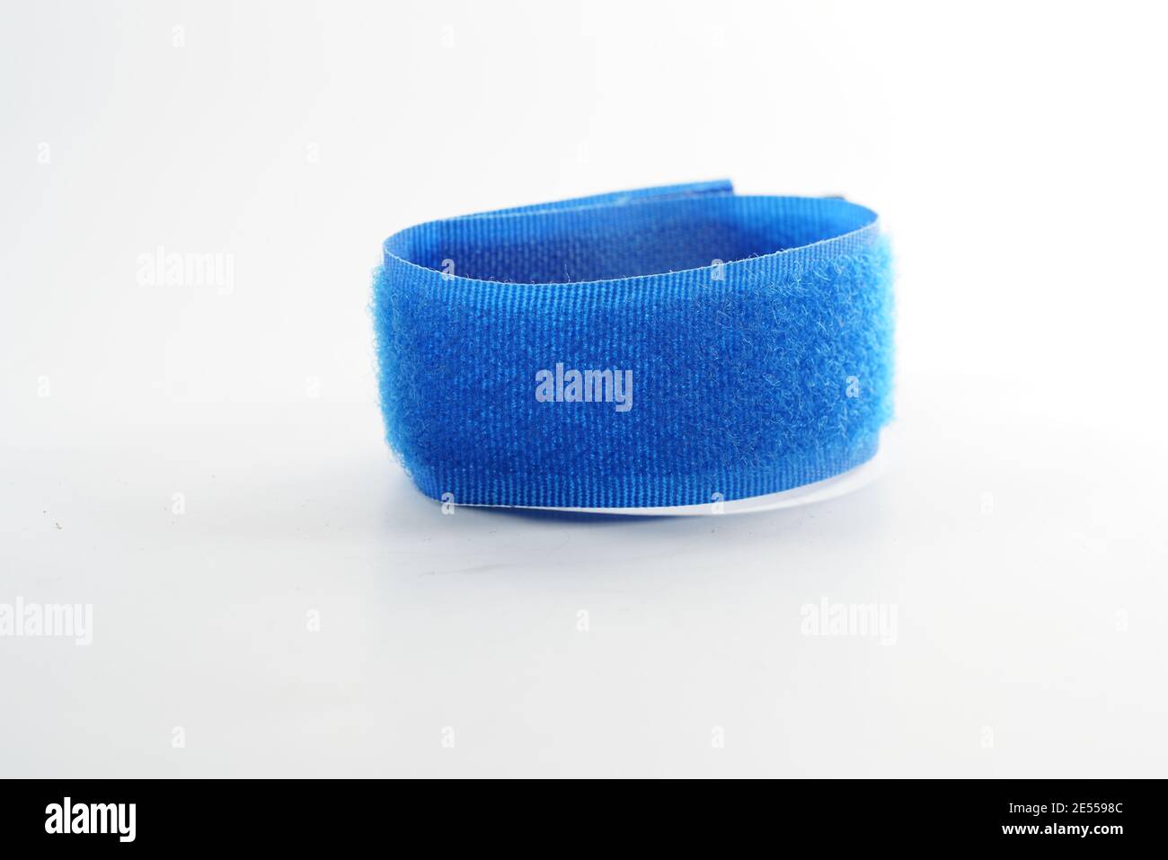 Closeup of a blue velcro strap isolated on white background Stock Photo ...