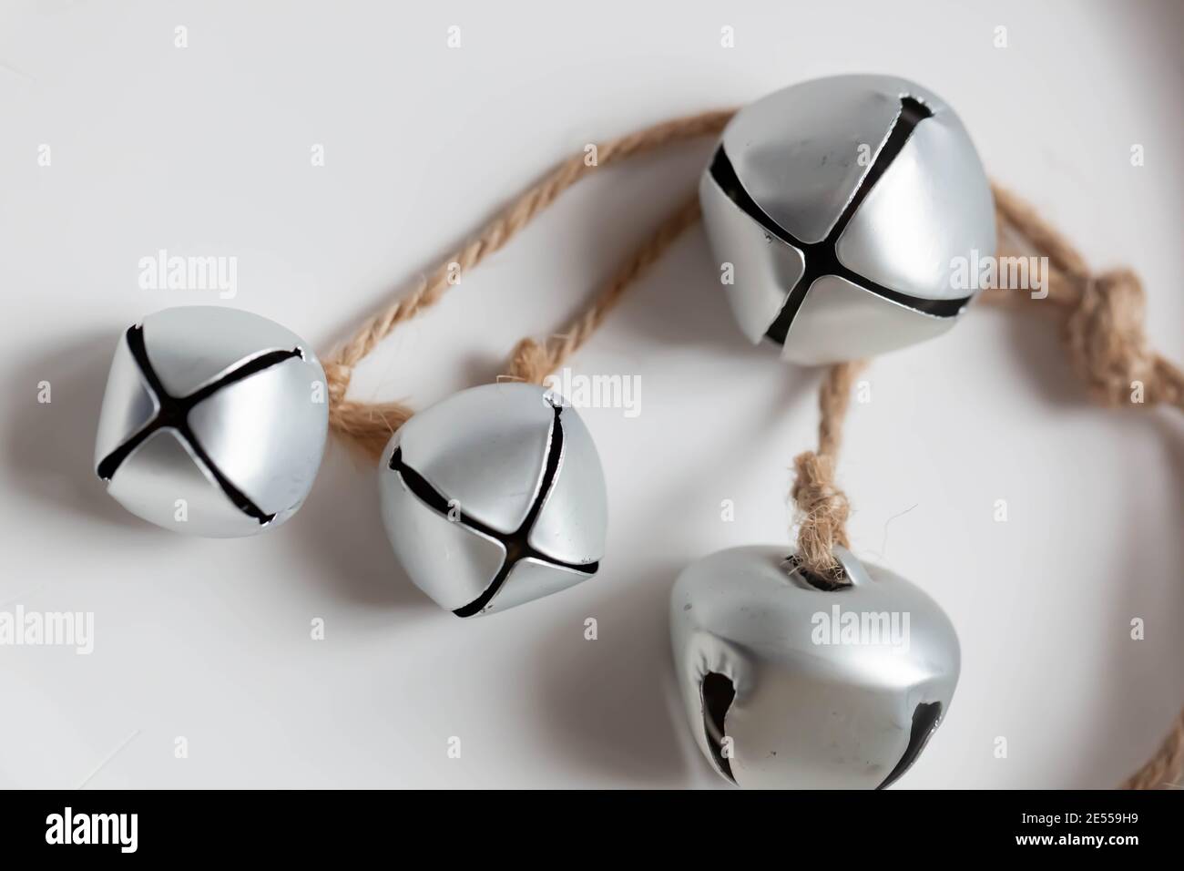 Abstract Objects - View of Silver Musical Bells tied to rope Stock ...