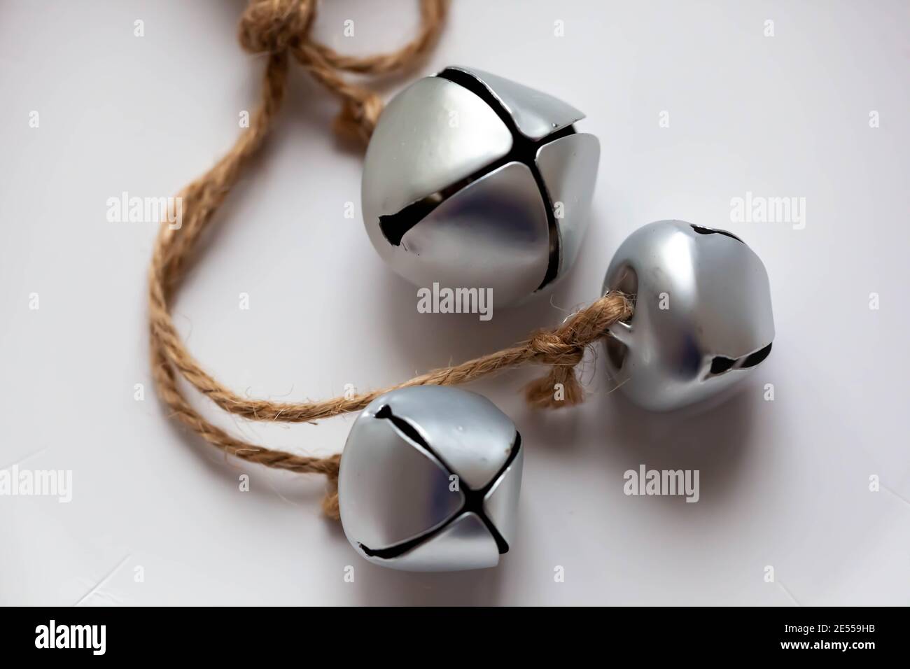 Abstracts & Objects - View of Silver Musical Bells tied to rope Stock ...