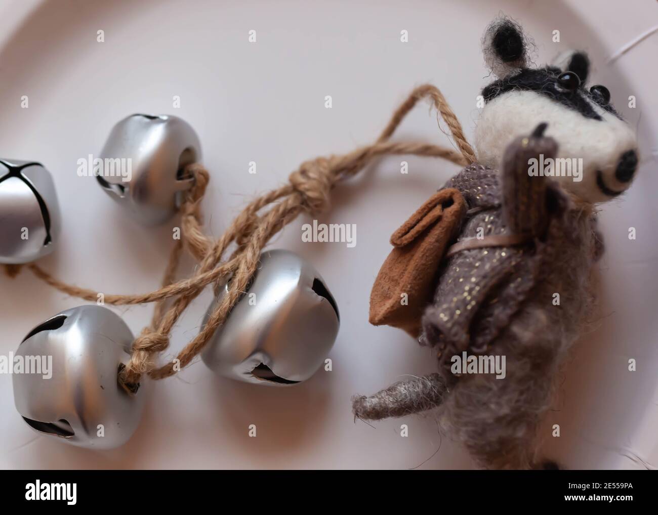 Abstracts & Objects / Concepts - View of felt badger hauling a string ...