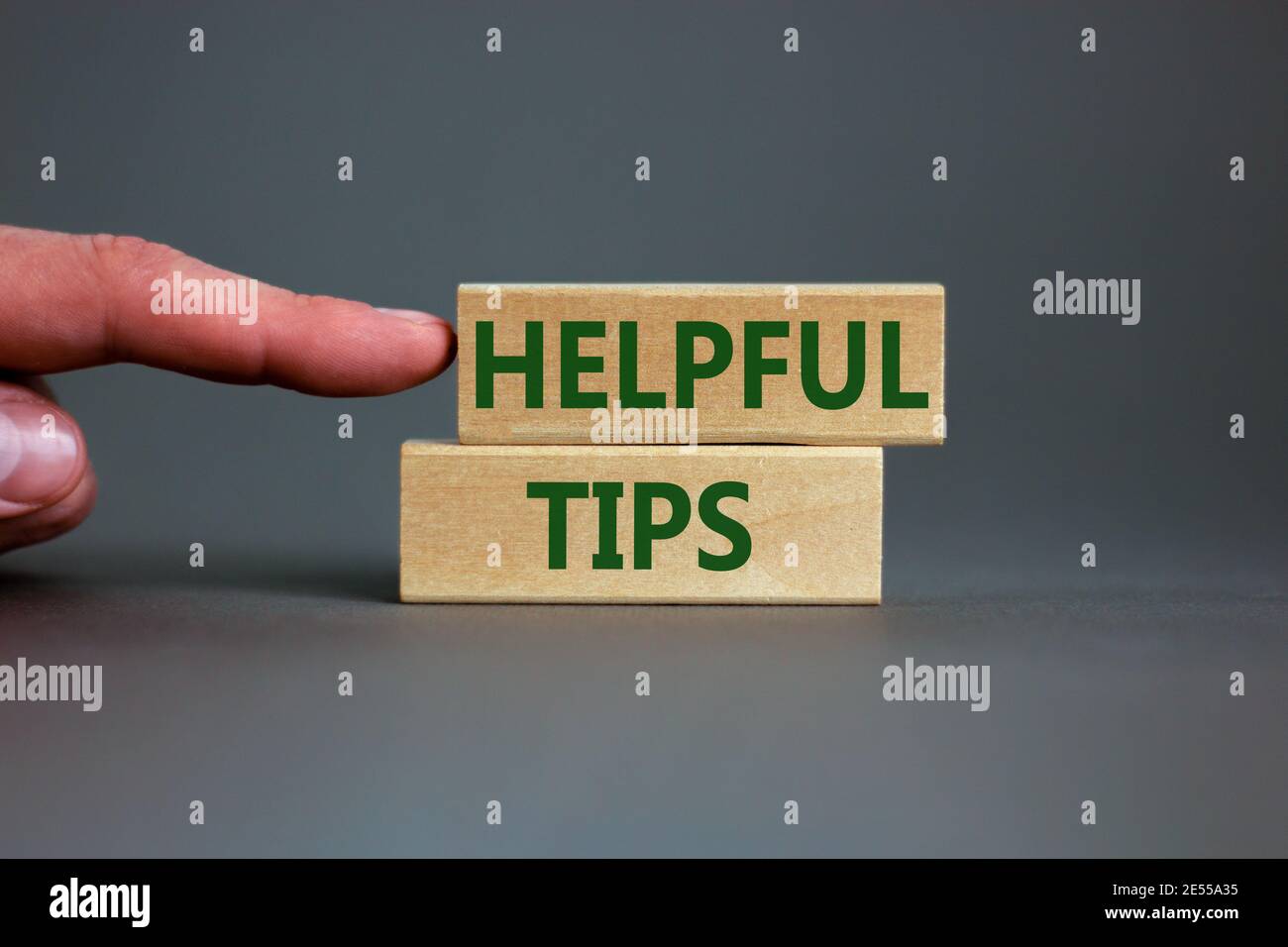 Helpful tips symbol. Wooden blocks with words 'Helpful tips'. Beautiful ...