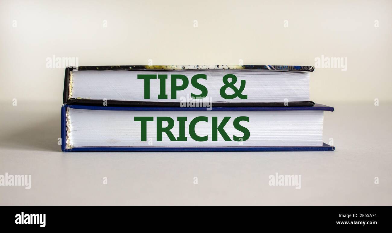 Tips and tricks symbol. Books with words 'Tips and tricks'. Beautiful ...