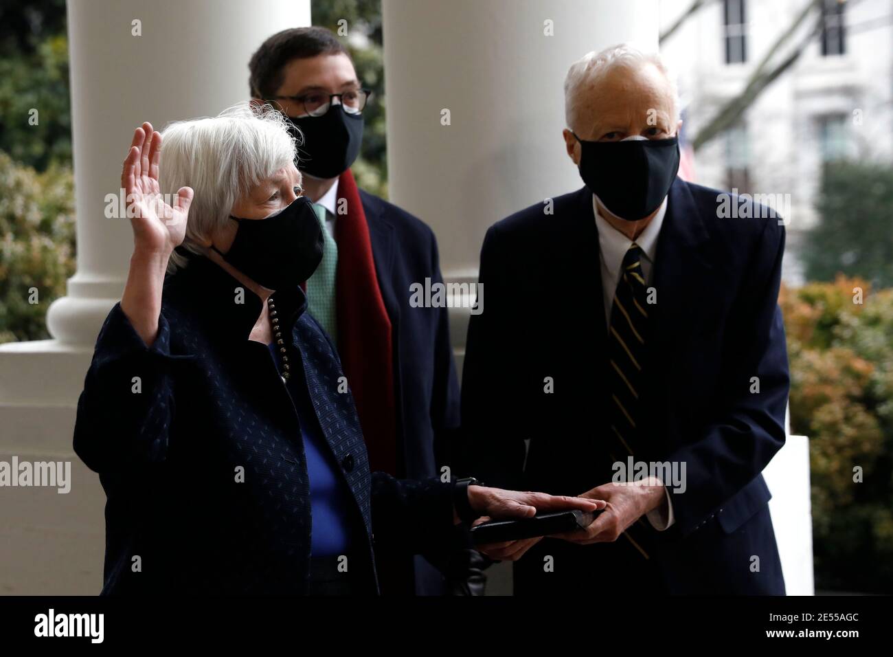 U.S. Treasury Secretary Janet Yellen (L) is sworn in next to her ...