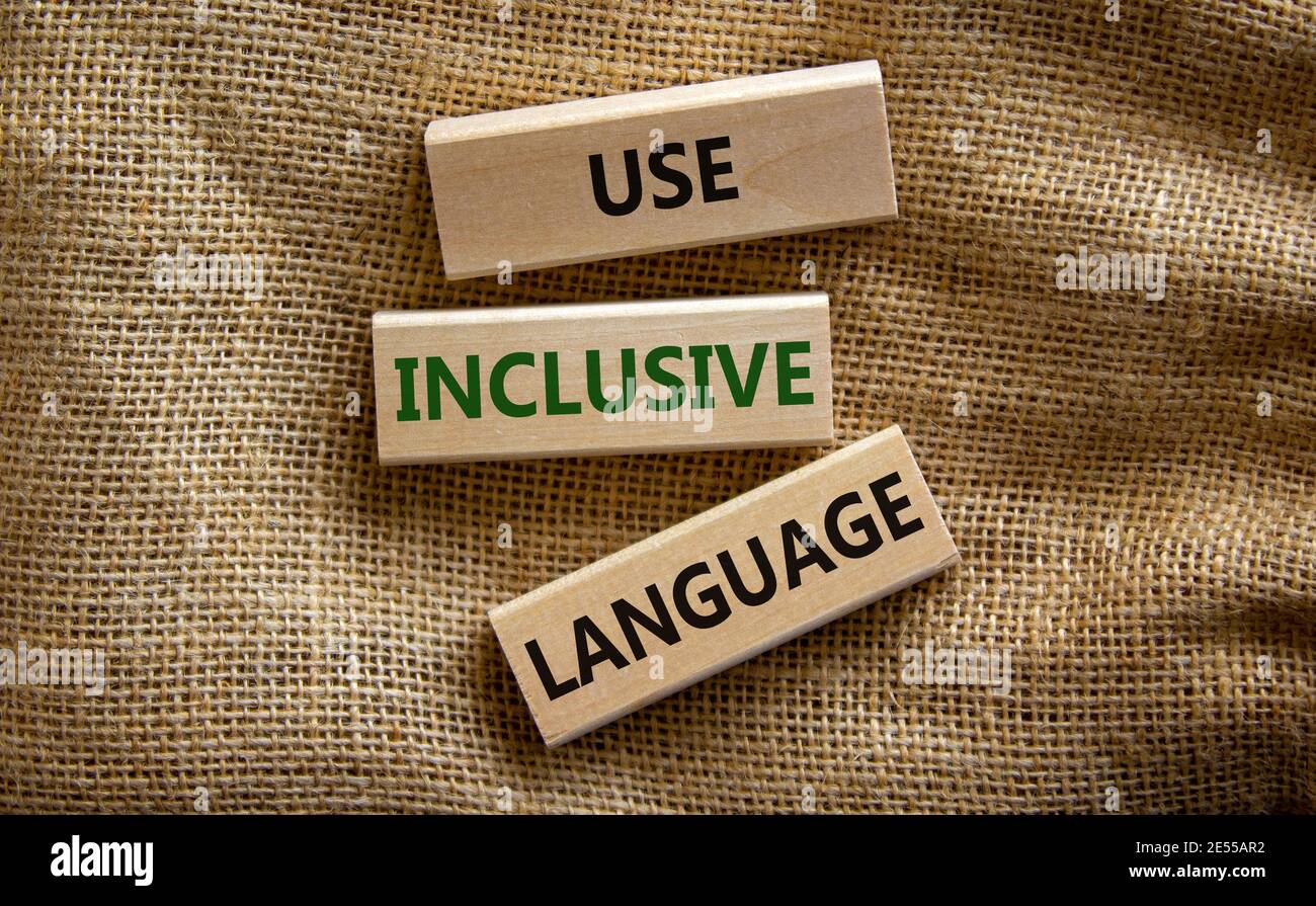 Use inclusive language symbol. Wooden blocks with words 'Use inclusive ...