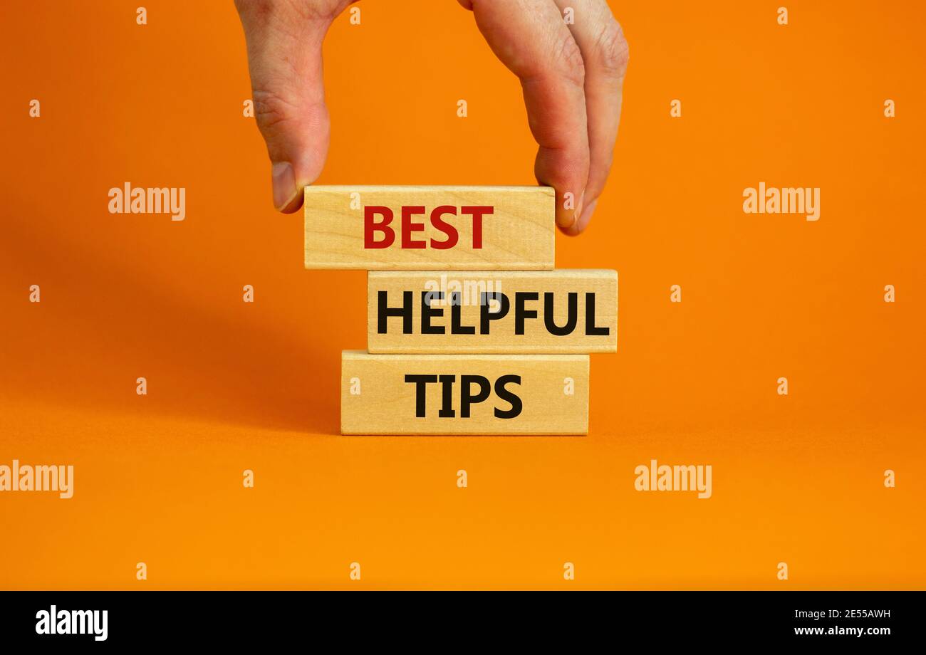 Best helpful tips symbol. Wooden blocks with words 'Best helpful tips ...