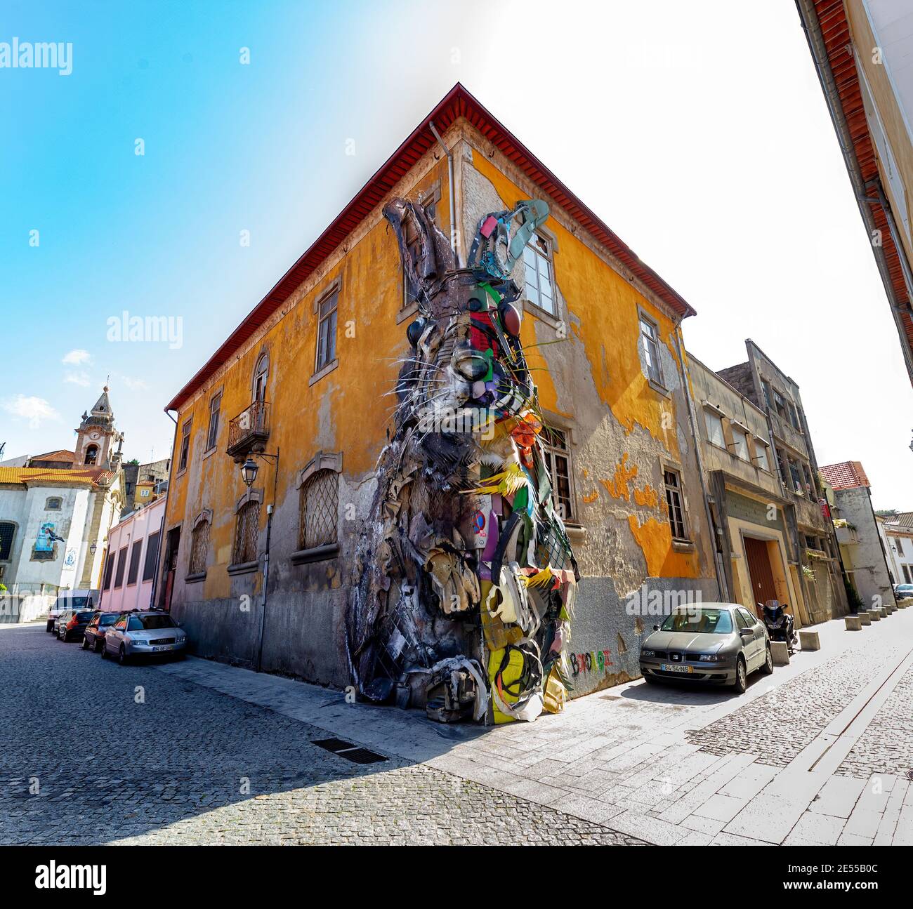 Half rabbit. Rabbit sculpture made from recycled materials and ...