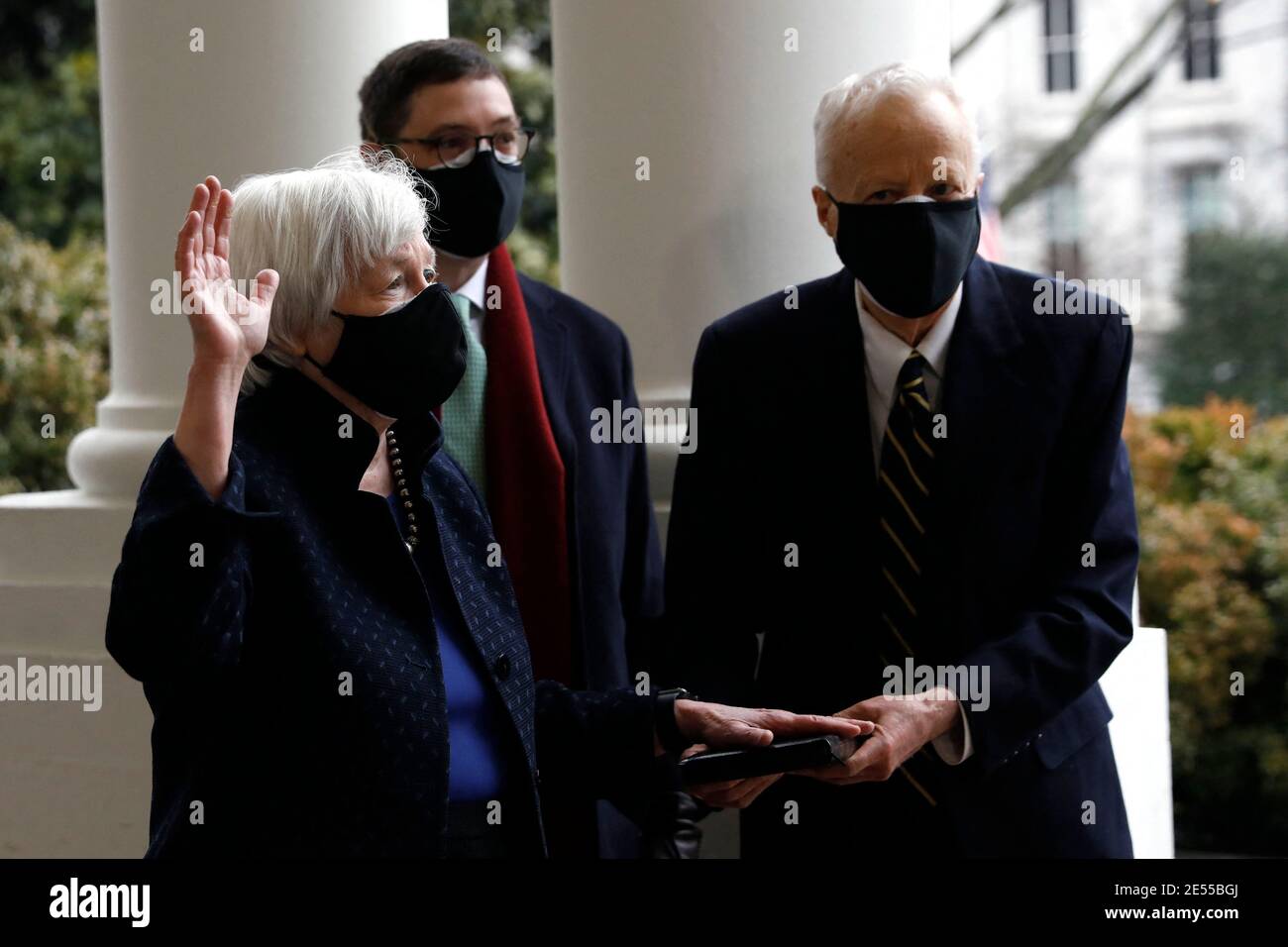 U.S. Treasury Secretary Janet Yellen (L) is sworn in next to her ...