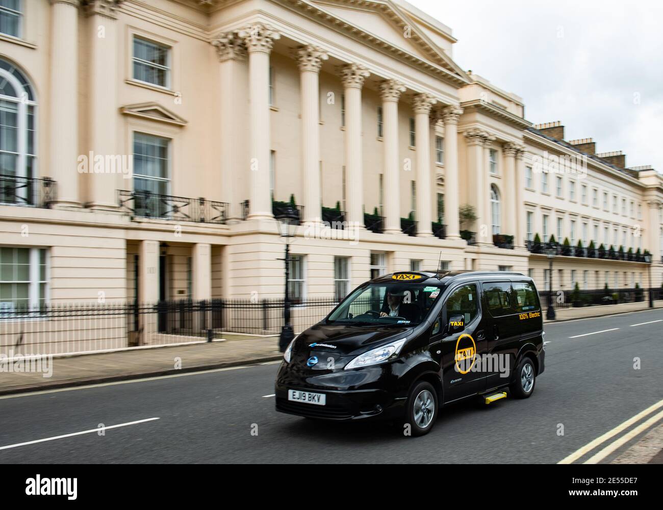 Electric taxi around London Stock Photo - Alamy