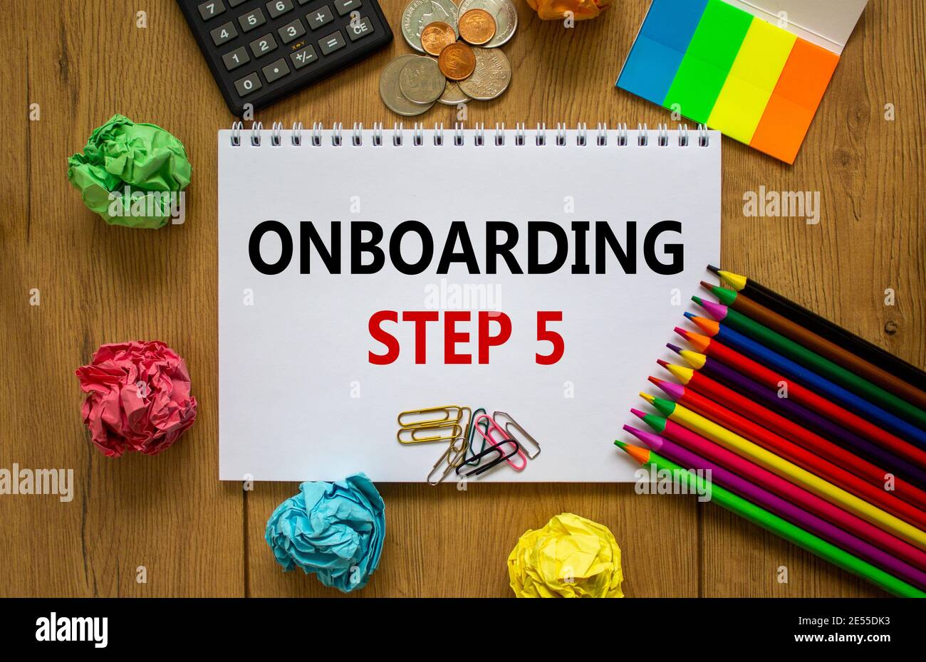 Onboarding symbol. White note with a word 'onboarding step 5' on ...