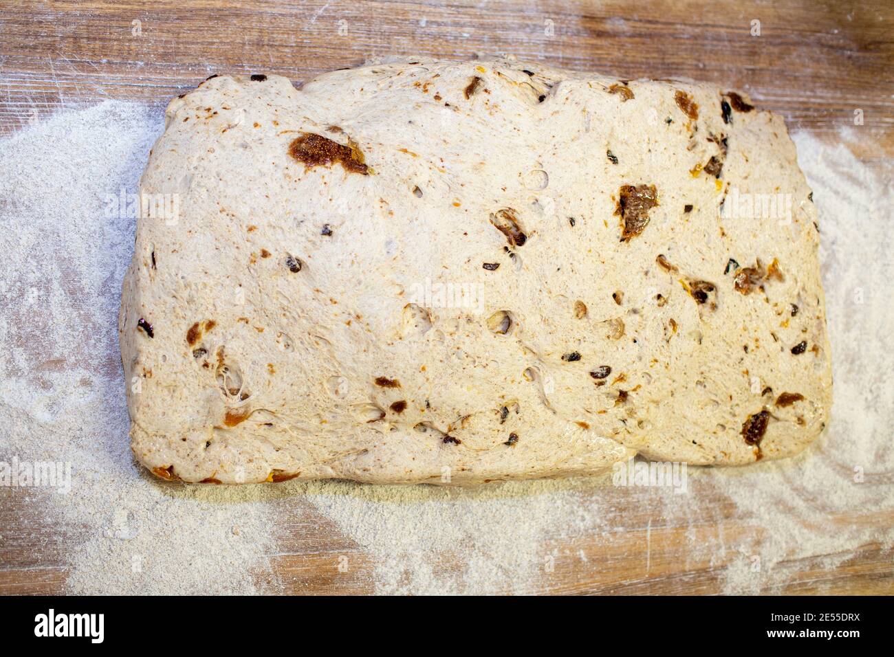 Raw sweet dough with dried fruits Stock Photo - Alamy