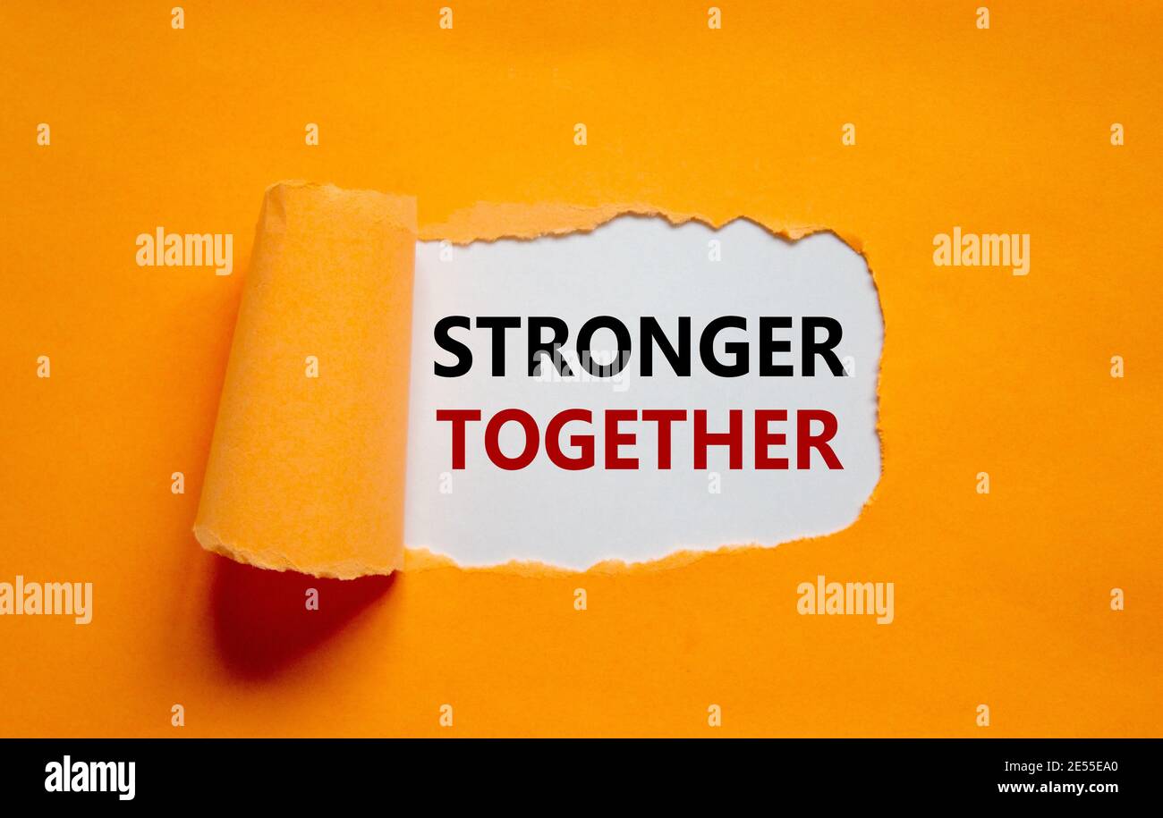 Stronger together symbol. Words Stronger together appearing behind torn ...
