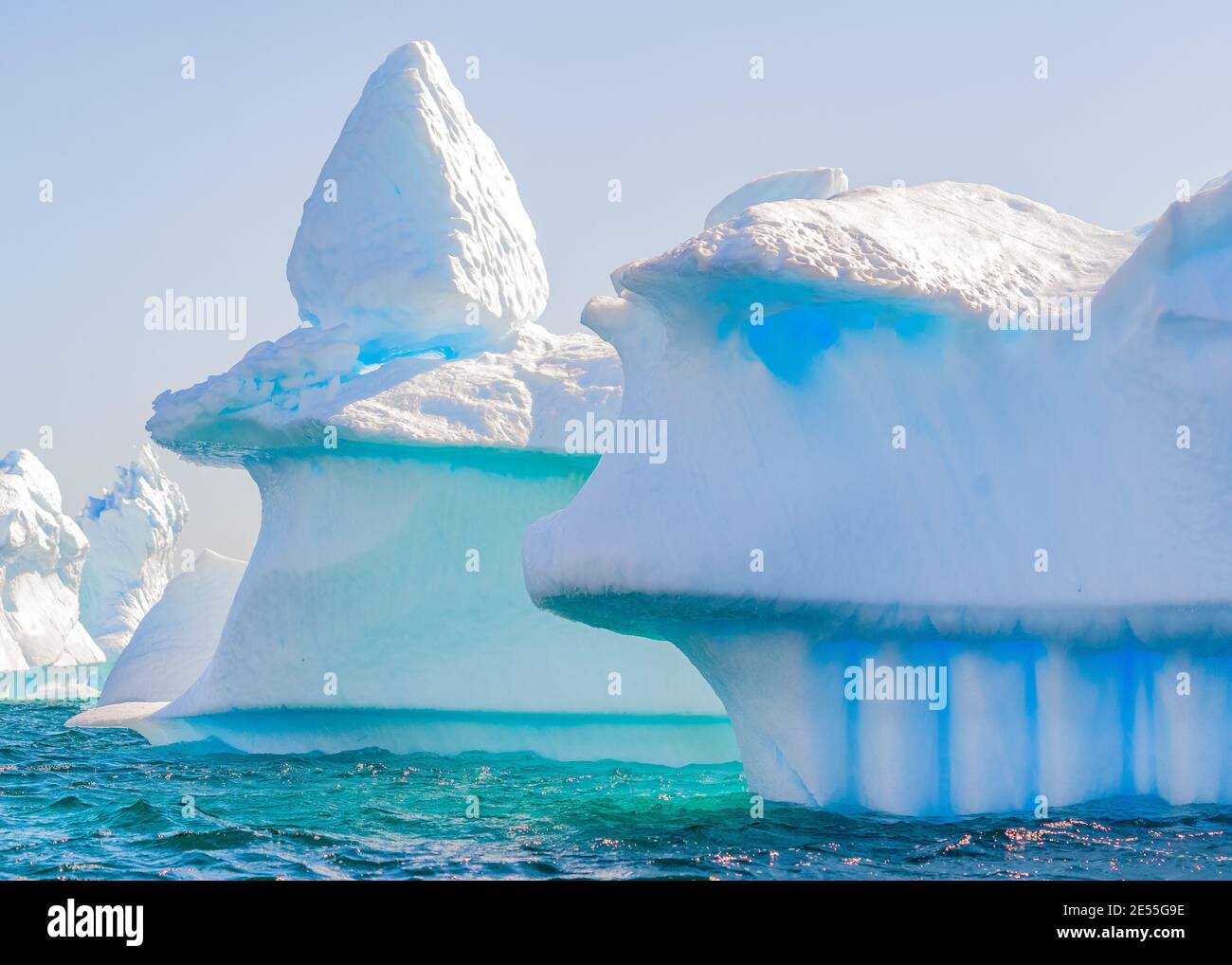 Beautiful icebergs carved by nature float in the Gerlache Strait off ...