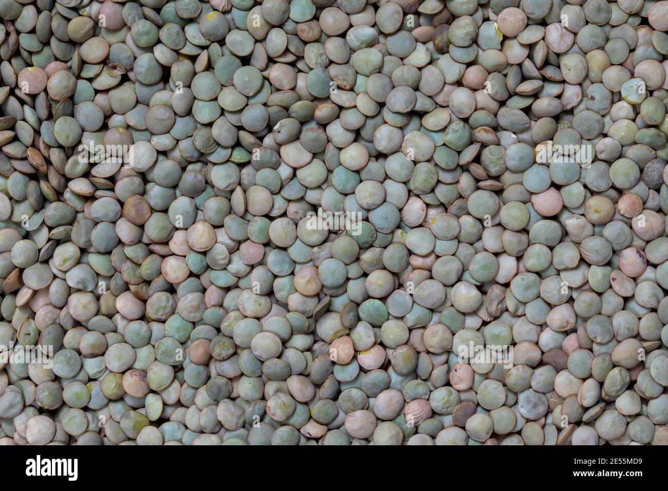 Raw green lentil background pattern and texture Stock Photo - Alamy