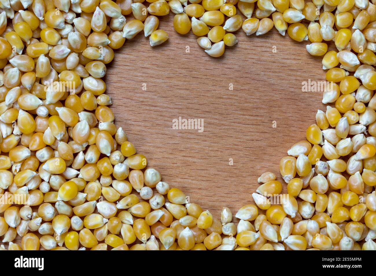 Popcorn grain and heart shape Stock Photo - Alamy