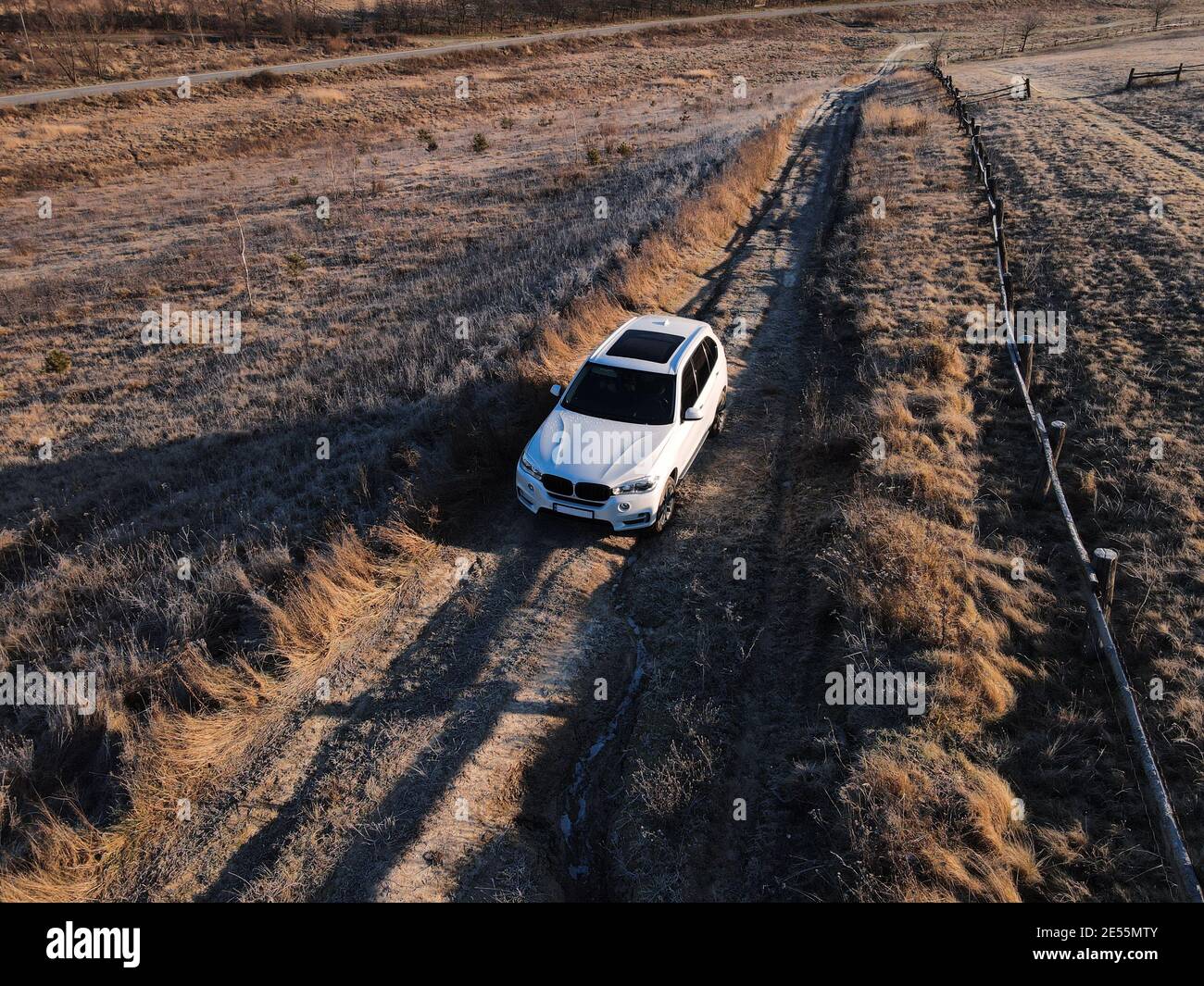 overhead top view of the suv car going by trail road copy space Stock ...