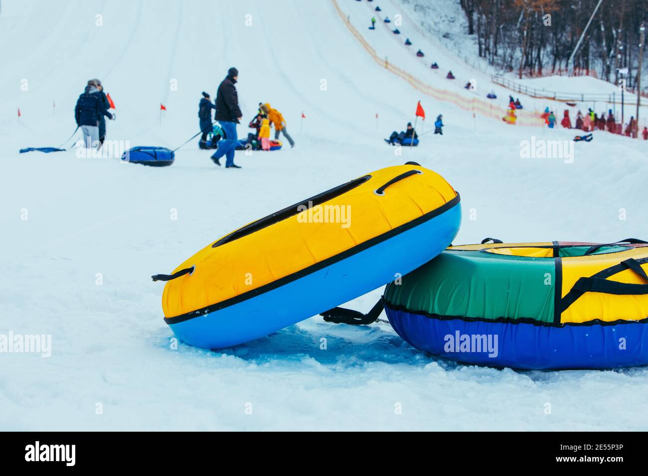 Women snow tubing hi-res stock photography and images - Alamy