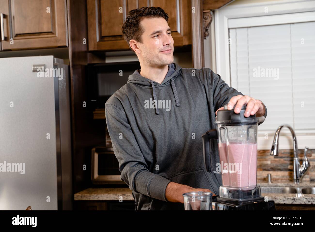 Making a smoothie Stock Photo - Alamy