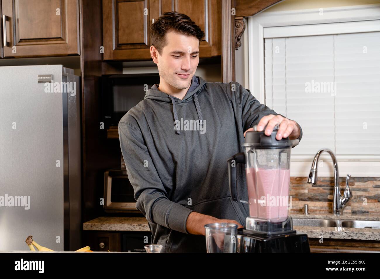 Making a smoothie Stock Photo - Alamy