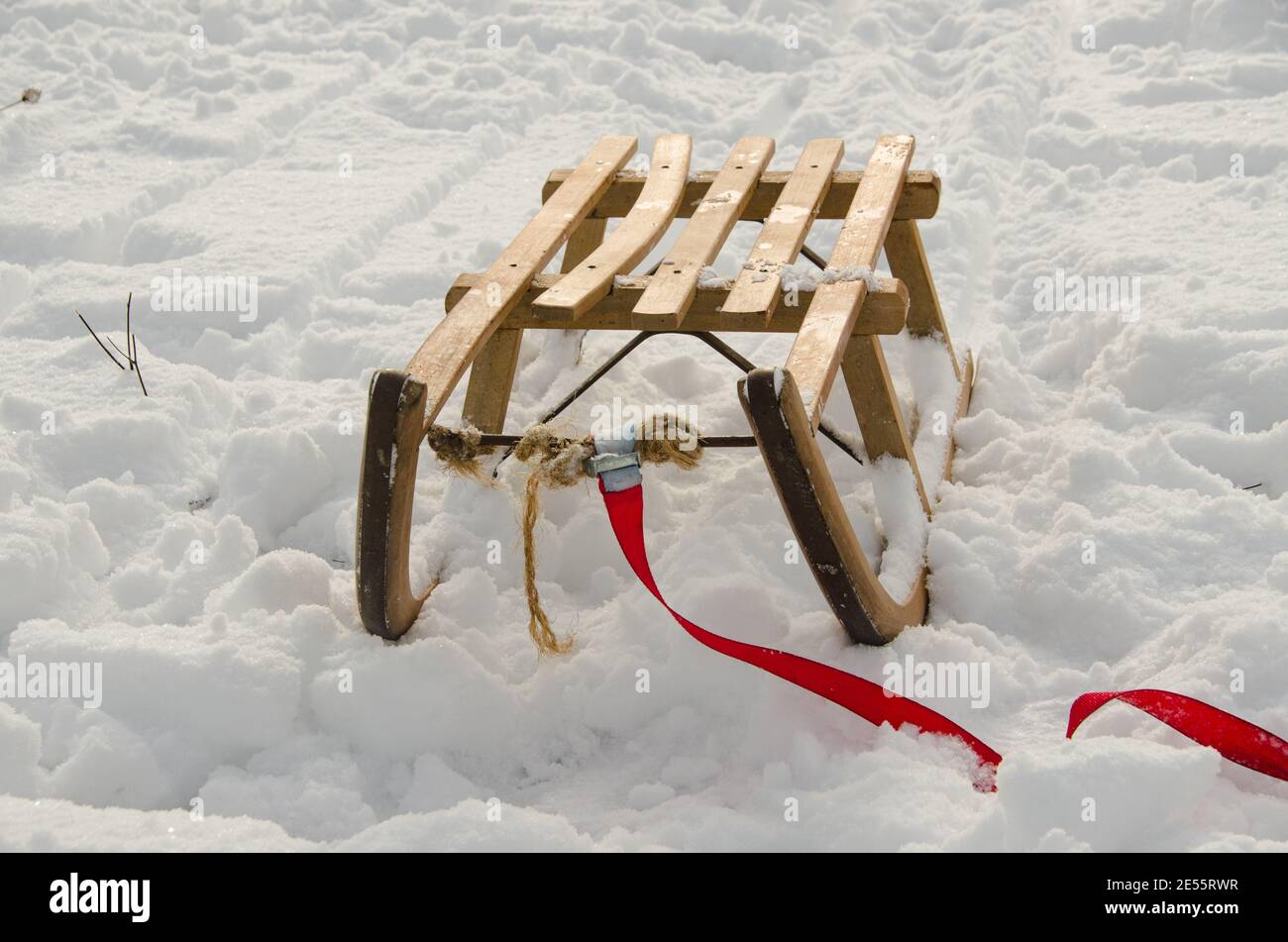 Wooden sledge in the snow Stock Photo - Alamy