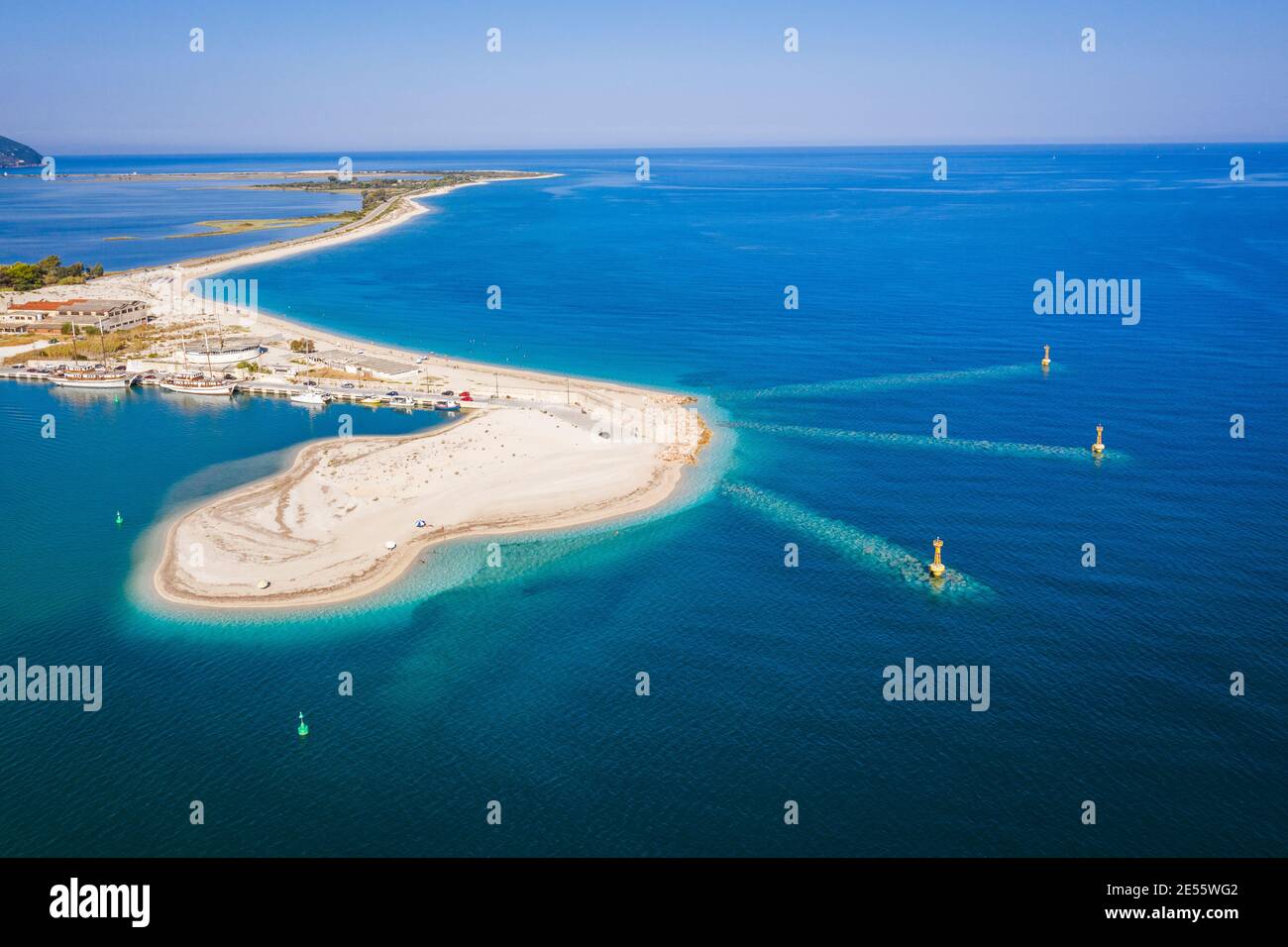 Aerial view of a secluded and spectacular beach with three lighthouses ...