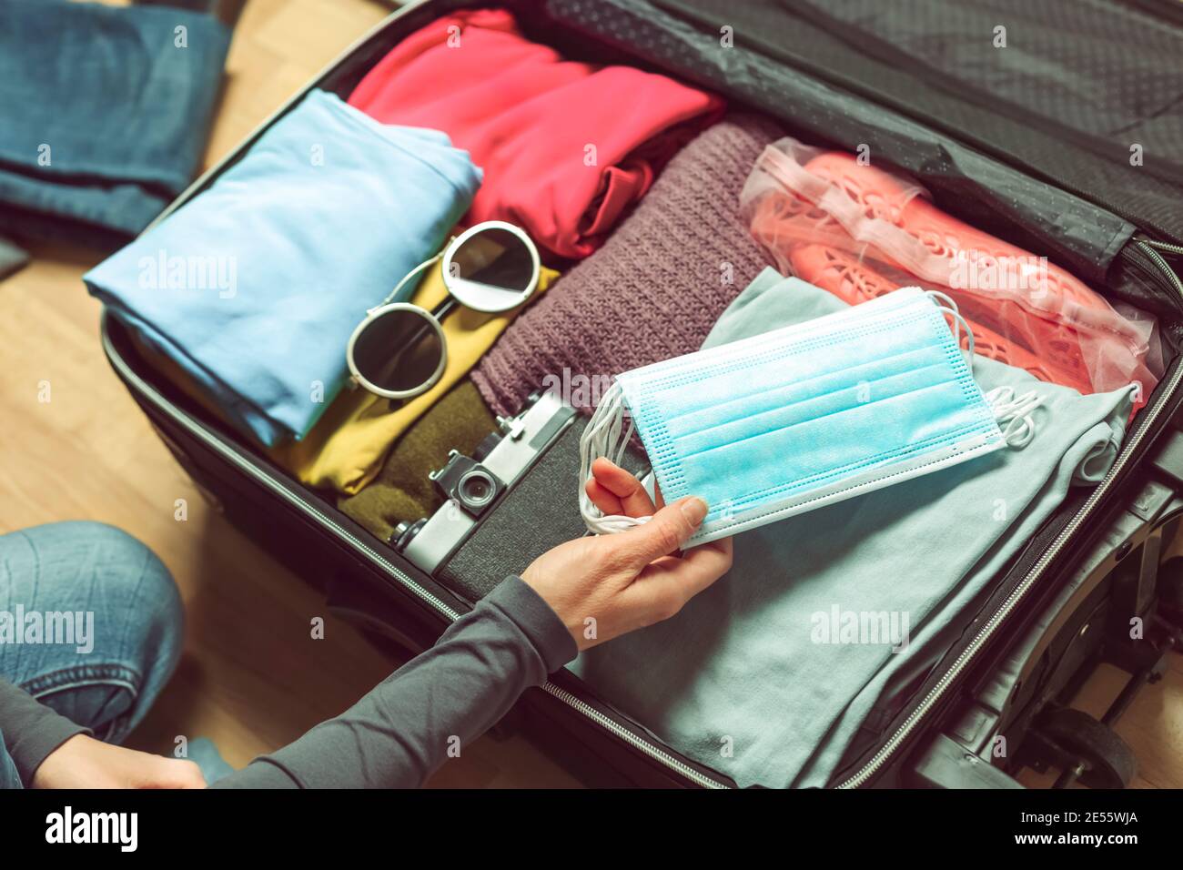 Open suitcase packed hi-res stock photography and images - Alamy
