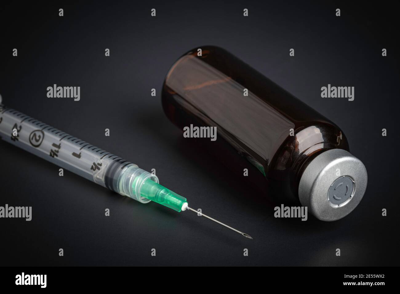 A close-up shot of a hygienic single-use plastic disposable syringe ...