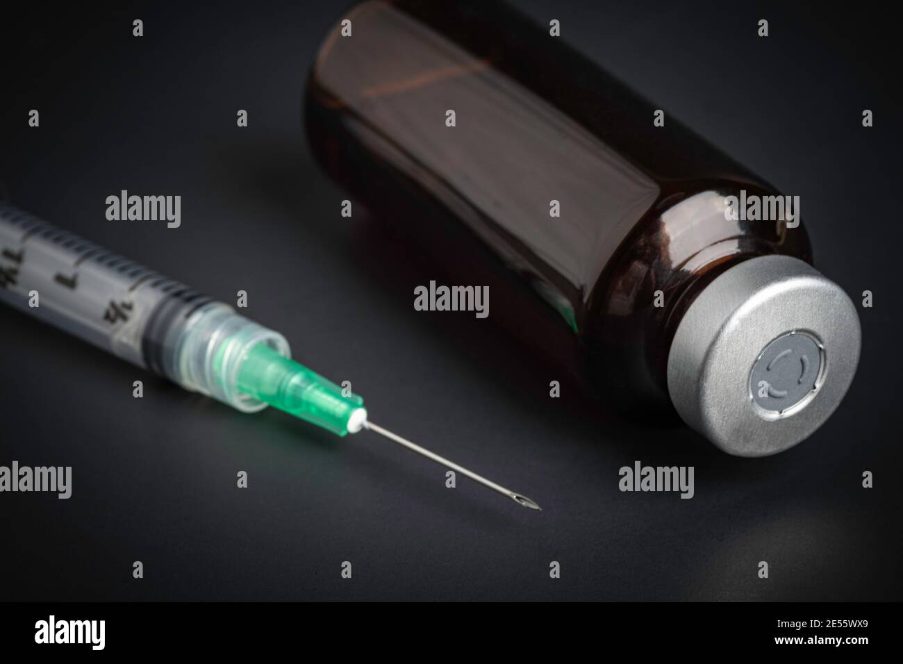 A close-up shot of a hygienic single-use plastic disposable syringe ...