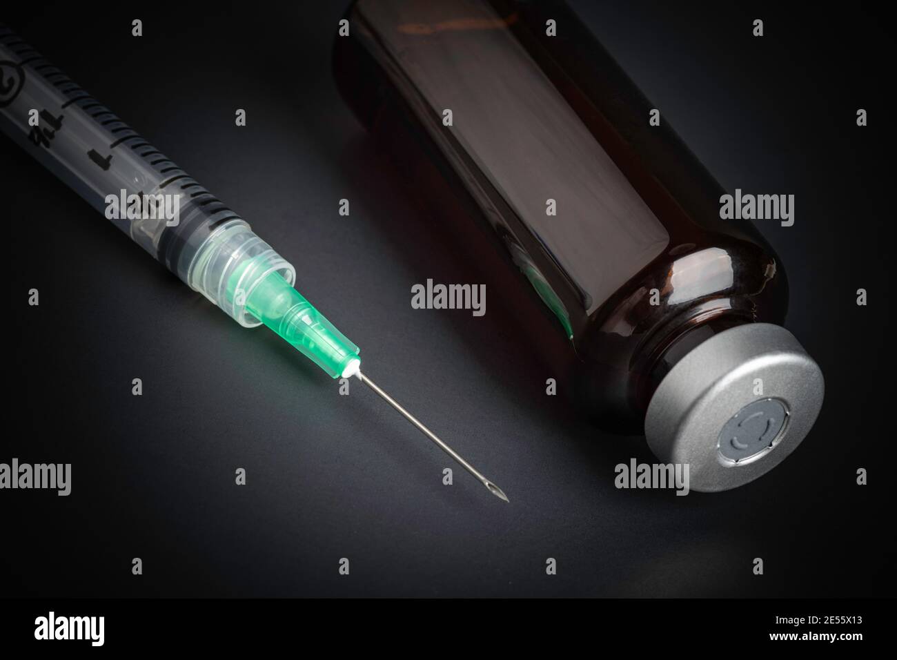 A close-up shot of a hygienic single-use plastic disposable syringe ...