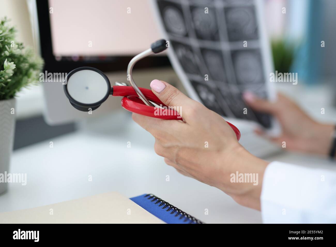 Doctor's hands are holding stethoscope and pictures of brain Stock ...