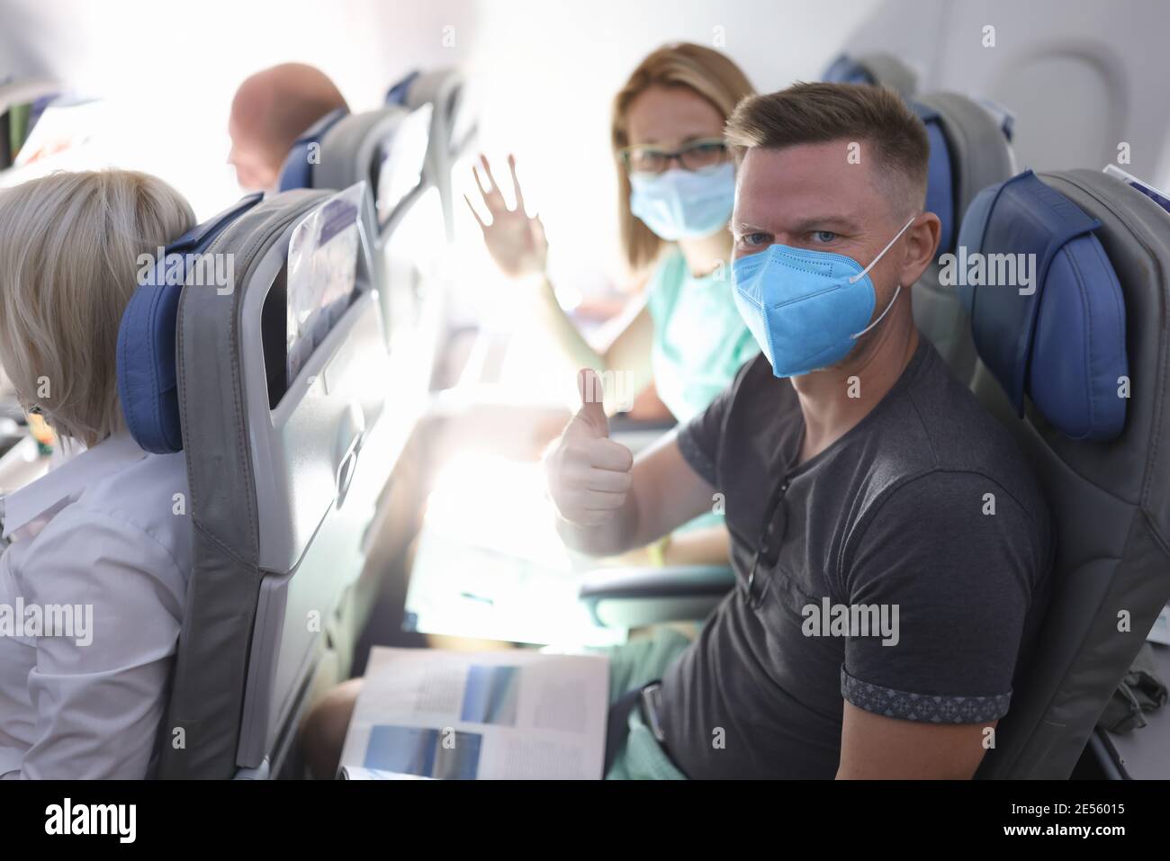 Masks on plane hi-res stock photography and images - Alamy