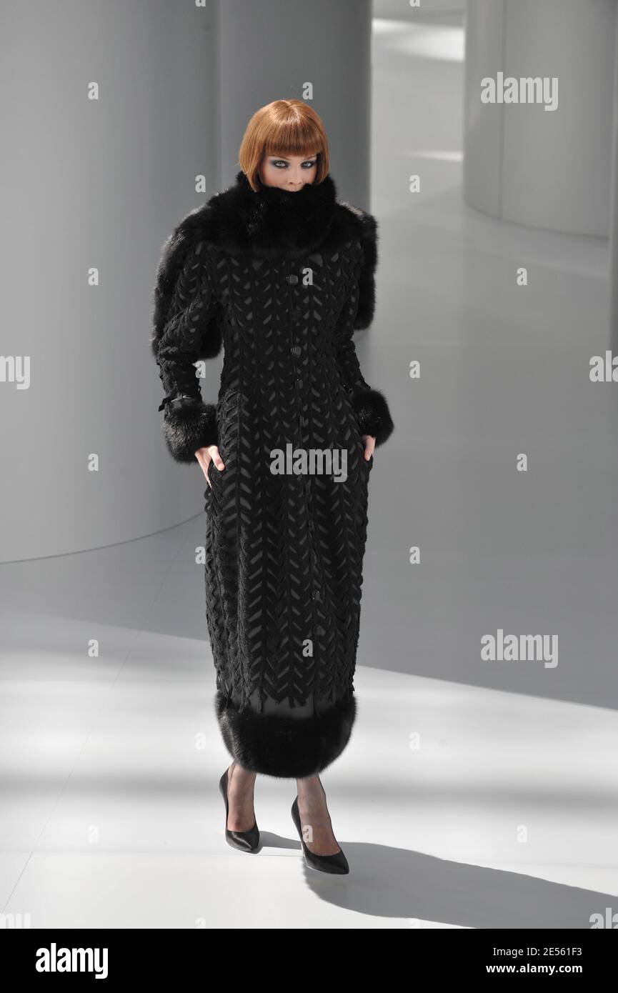 A model displays a creation by designer Karl Lagerfeld for Chanel fall ...