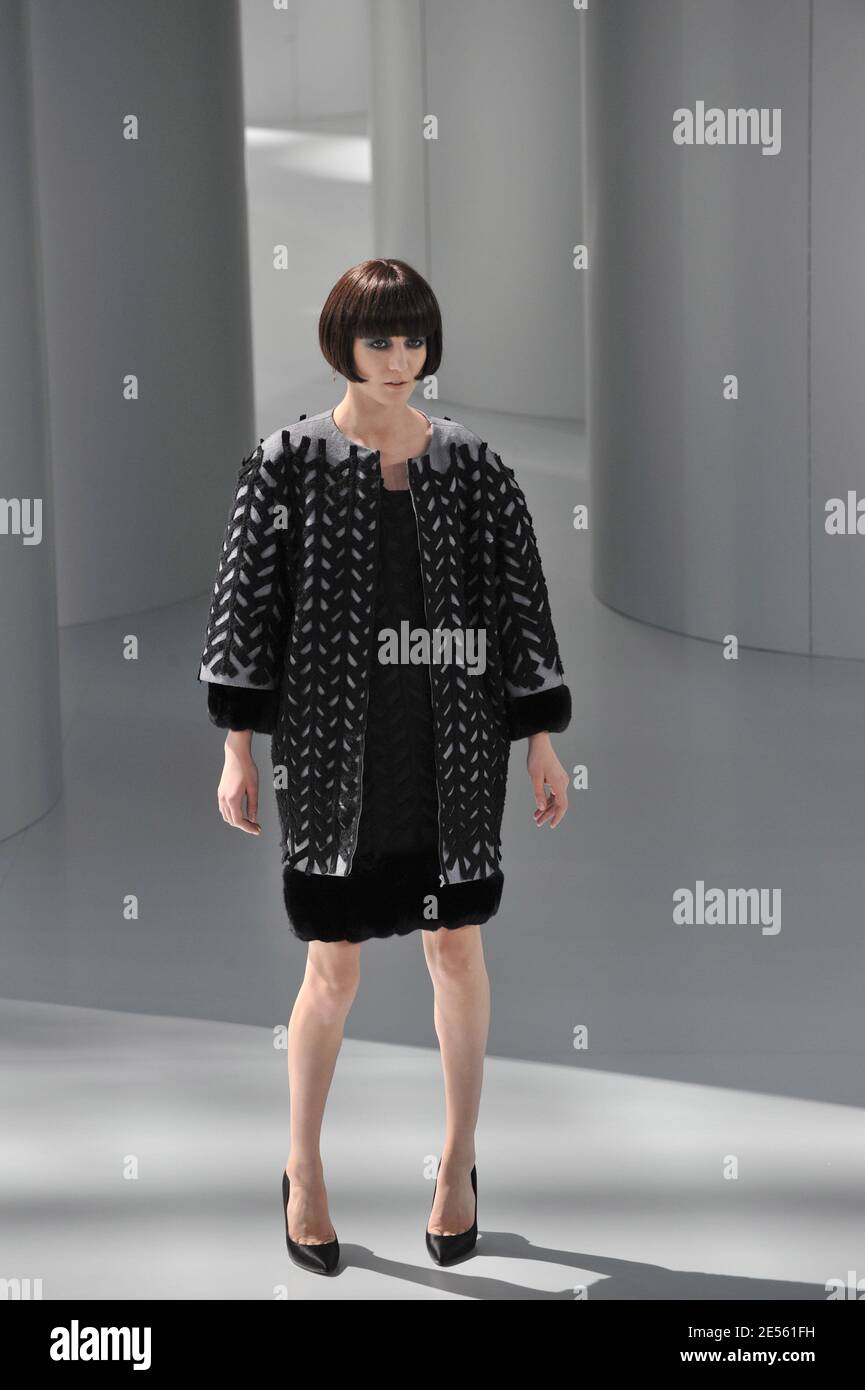 A model displays a creation by designer Karl Lagerfeld for Chanel fall ...