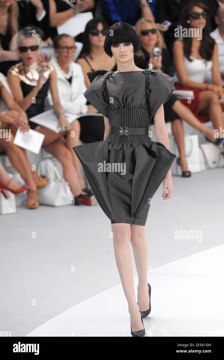 A model displays a creation by designer Karl Lagerfeld for Chanel fall ...