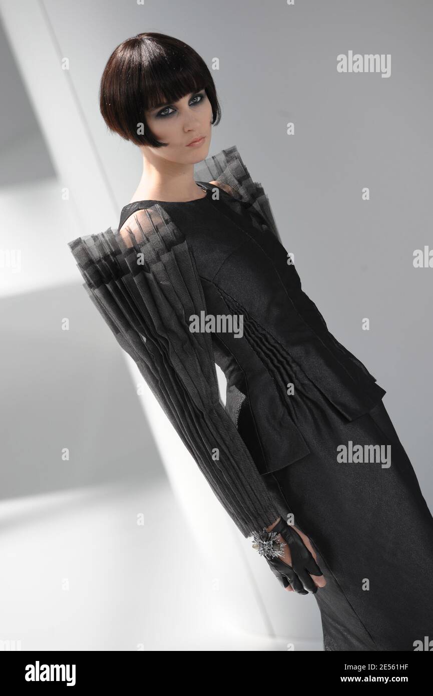 A model displays a creation by designer Karl Lagerfeld for Chanel fall ...