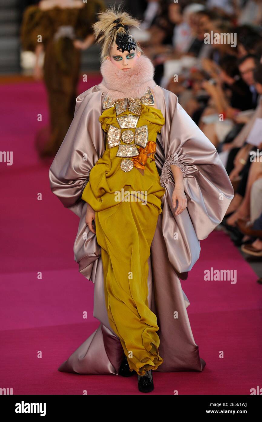 A model presents a creation by French designer Christian Lacroix as ...