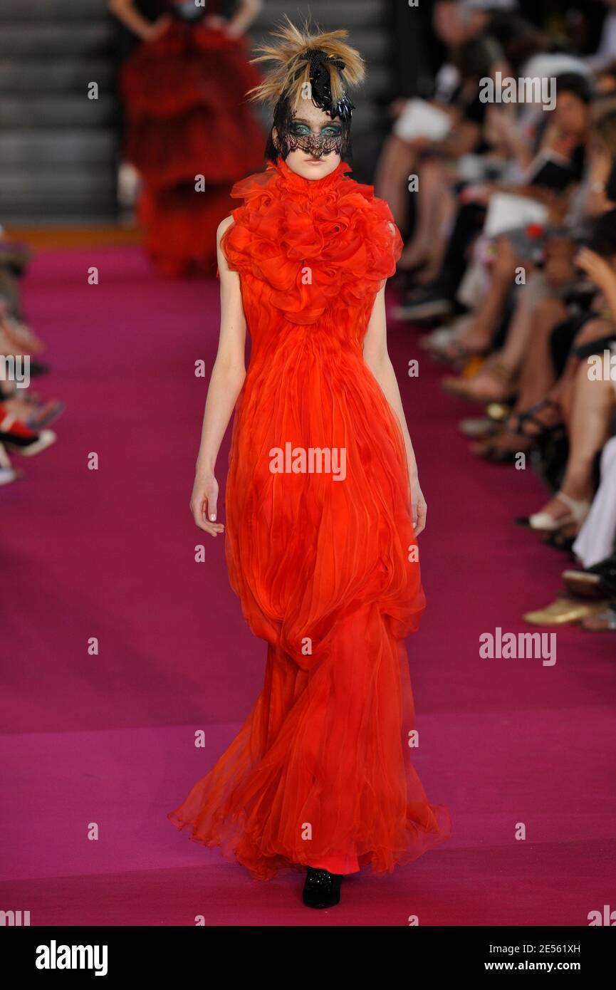 A model presents a creation by French designer Christian Lacroix as ...