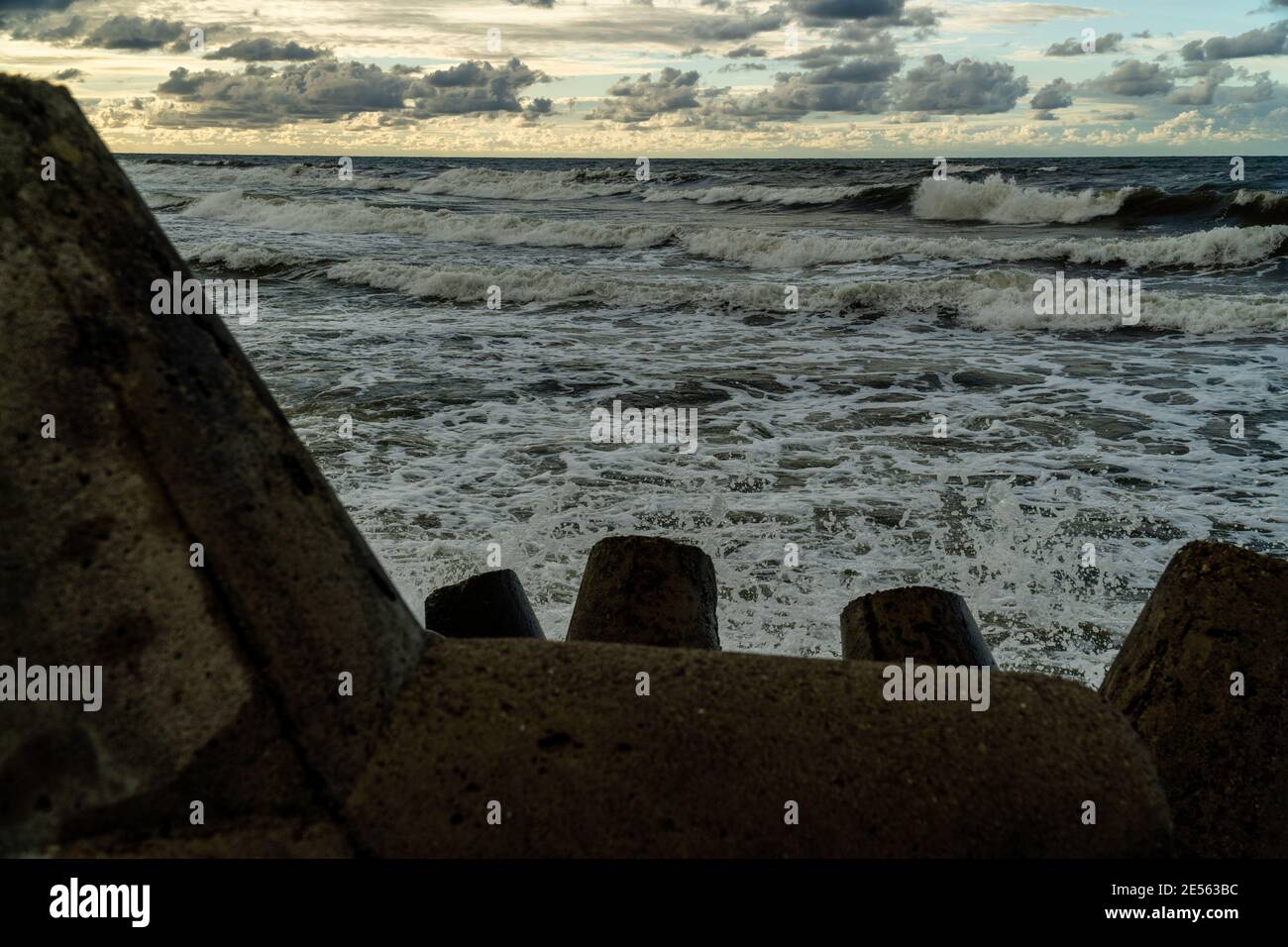 Water splashing against the flood embankment Stock Photo - Alamy