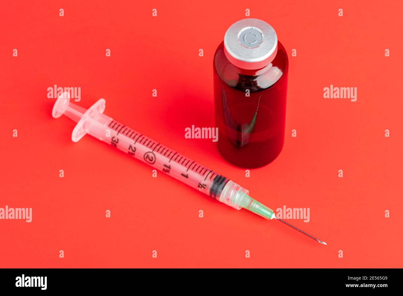 A close-up shot of a hygienic single-use plastic disposable syringe ...