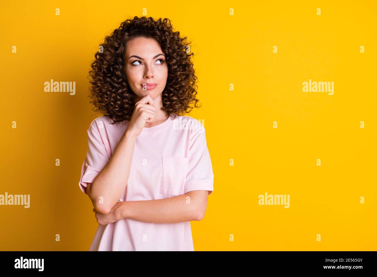 Photo of pretty young lady think wonder guess idea plan hand touch chin ...