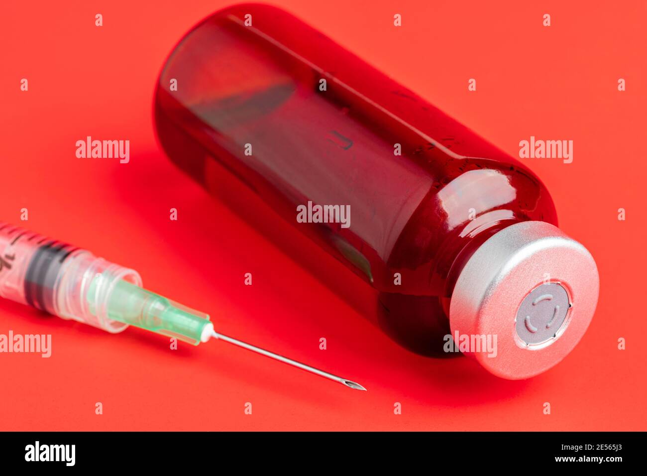 A close-up shot of a hygienic single-use plastic disposable syringe ...