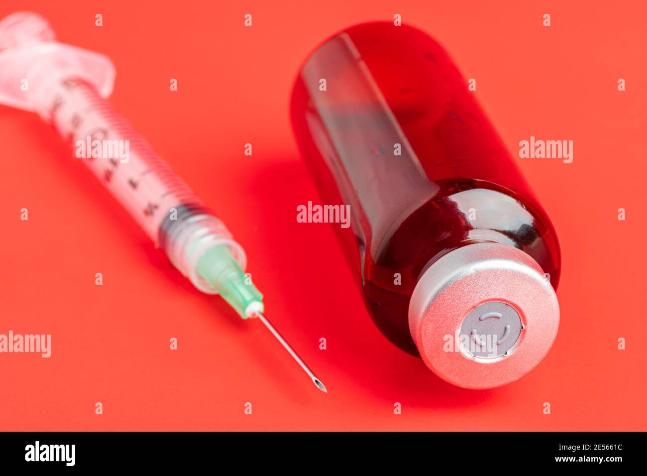 A close-up shot of a hygienic single-use plastic disposable syringe ...