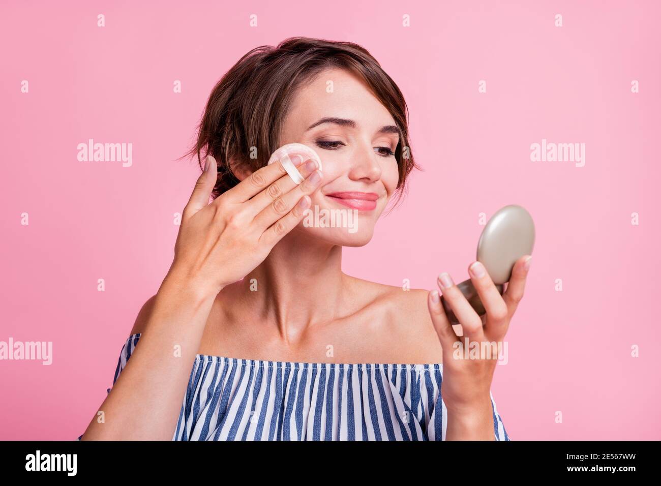 Closeup photo portrait of pretty girl blushing cheeks looking at mirror ...
