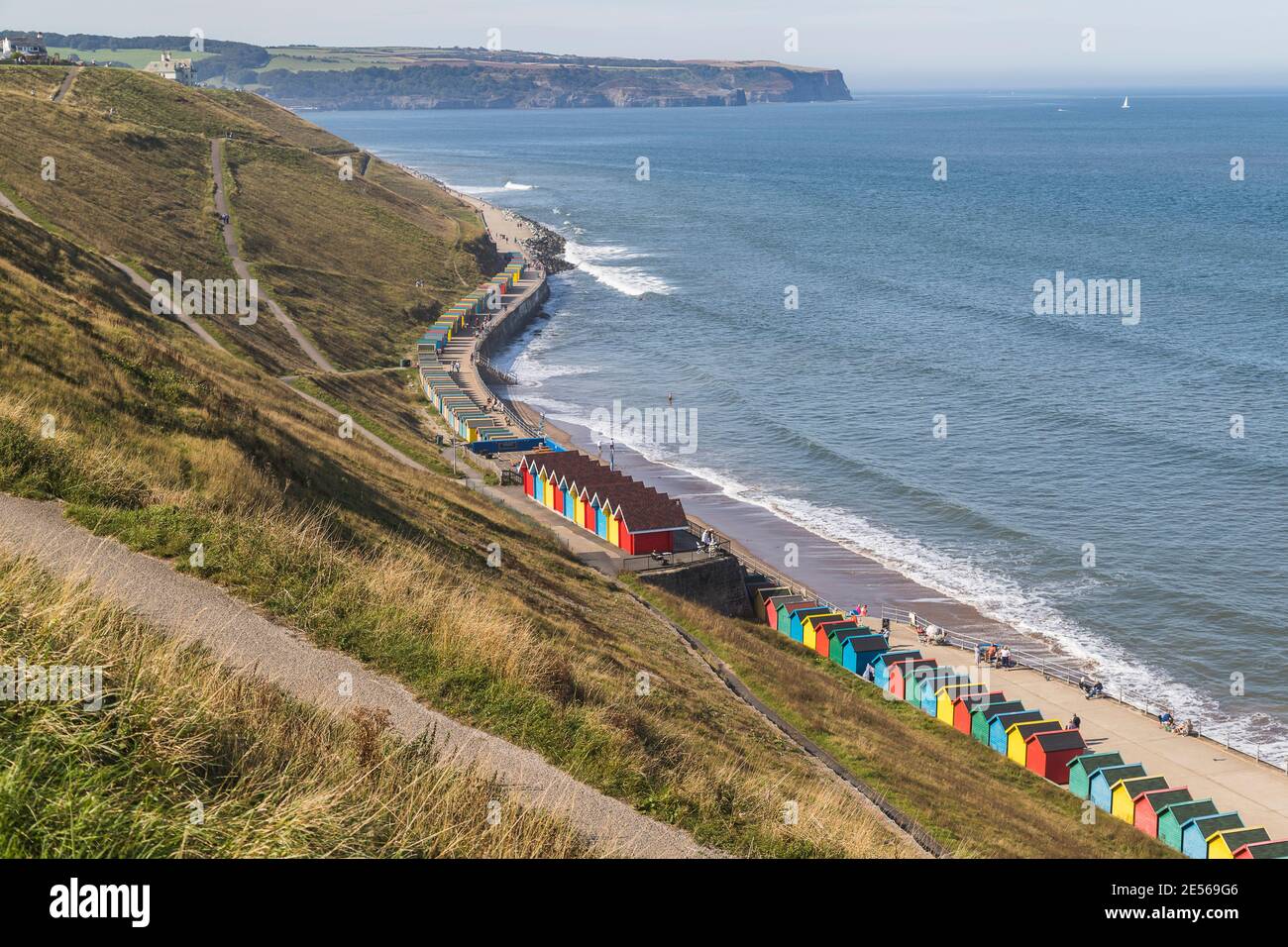 Beach huts on the Whitby seafront Stock Photo - Alamy