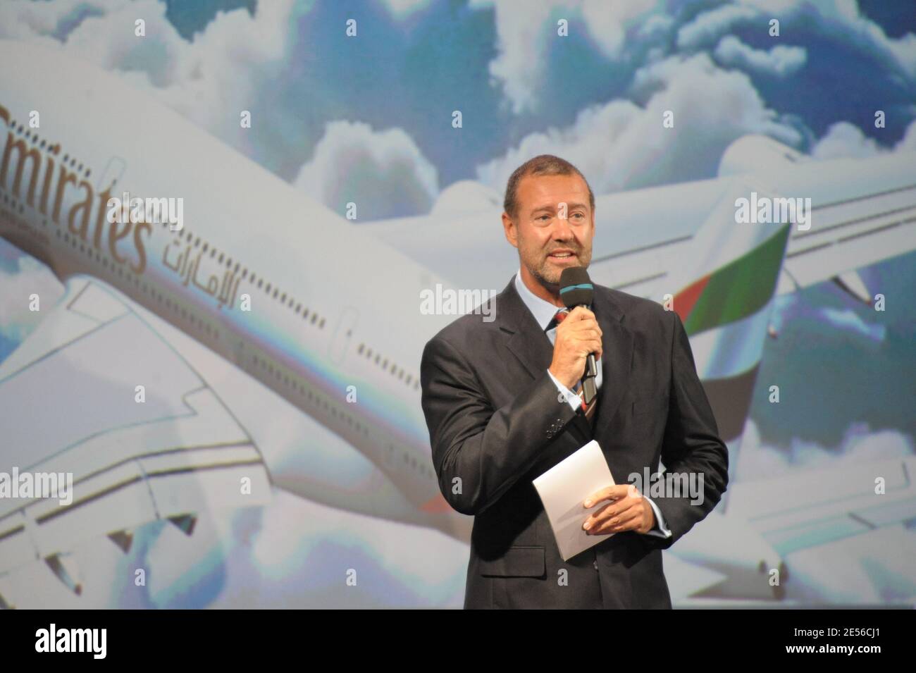 Journalist Alex Taylor speaks during the handing over ceremony of the ...