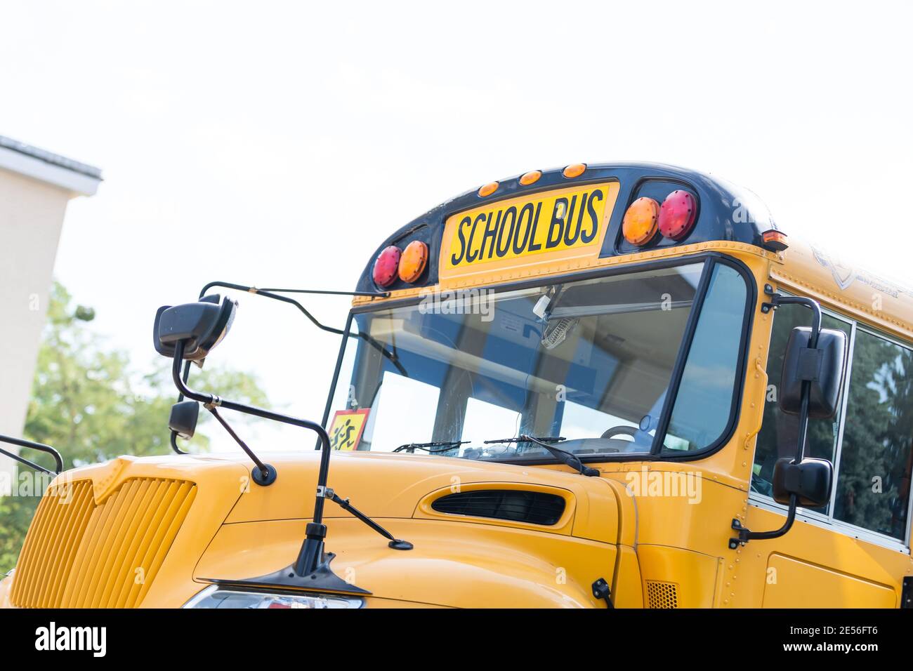 School bus sign on the front of yellow school bus hi-res stock ...