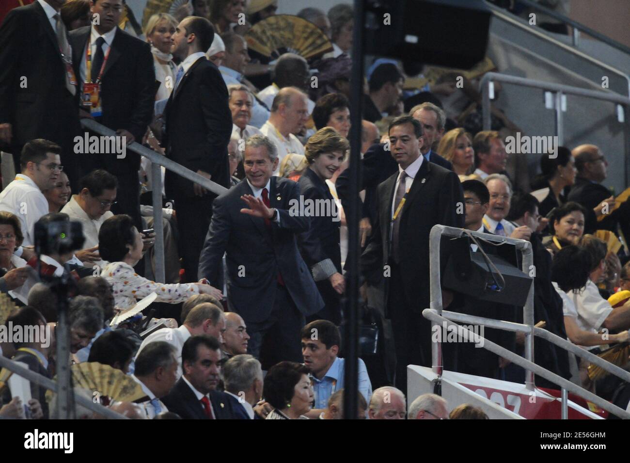 US President George Bush and wife Laura attend the opening ceremony of ...